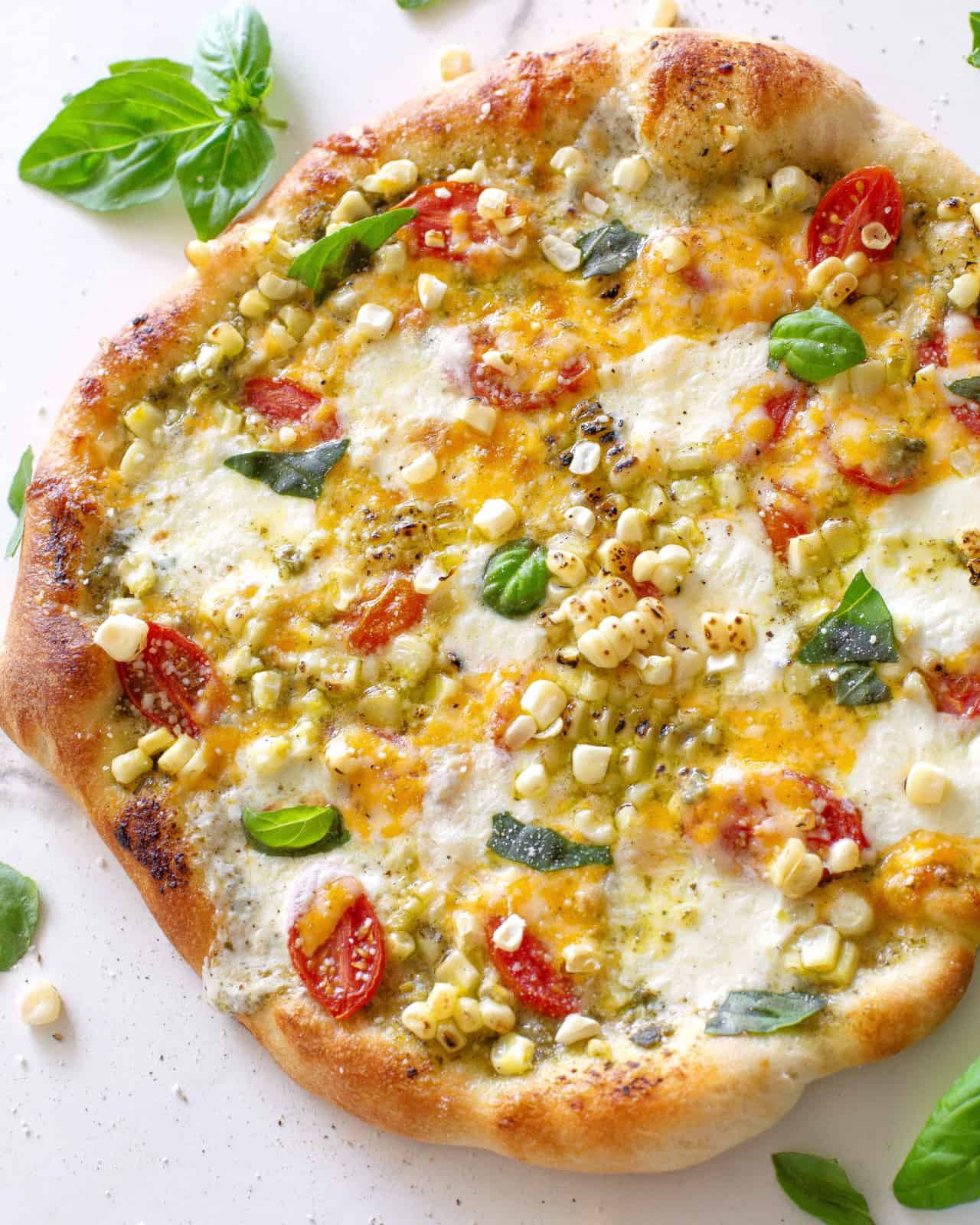 Charred Corn, Tomato, and Basil Pesto Pizza | The Girl Who Ate Everything